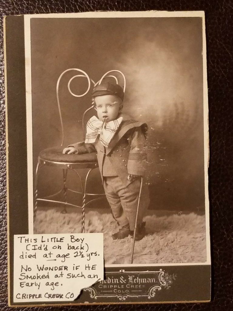 Vintage Smoking Boy Photo with History - LarryFlaxman.com